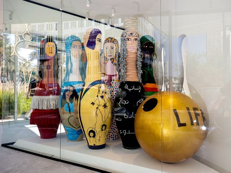 Human trafficking survivors speak through life-sized bowling pins ...
